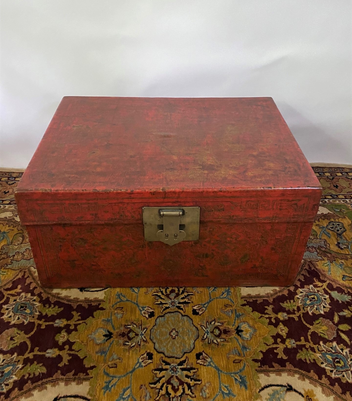 Old Decorated Red Leather Trunk | Wood and Hogan