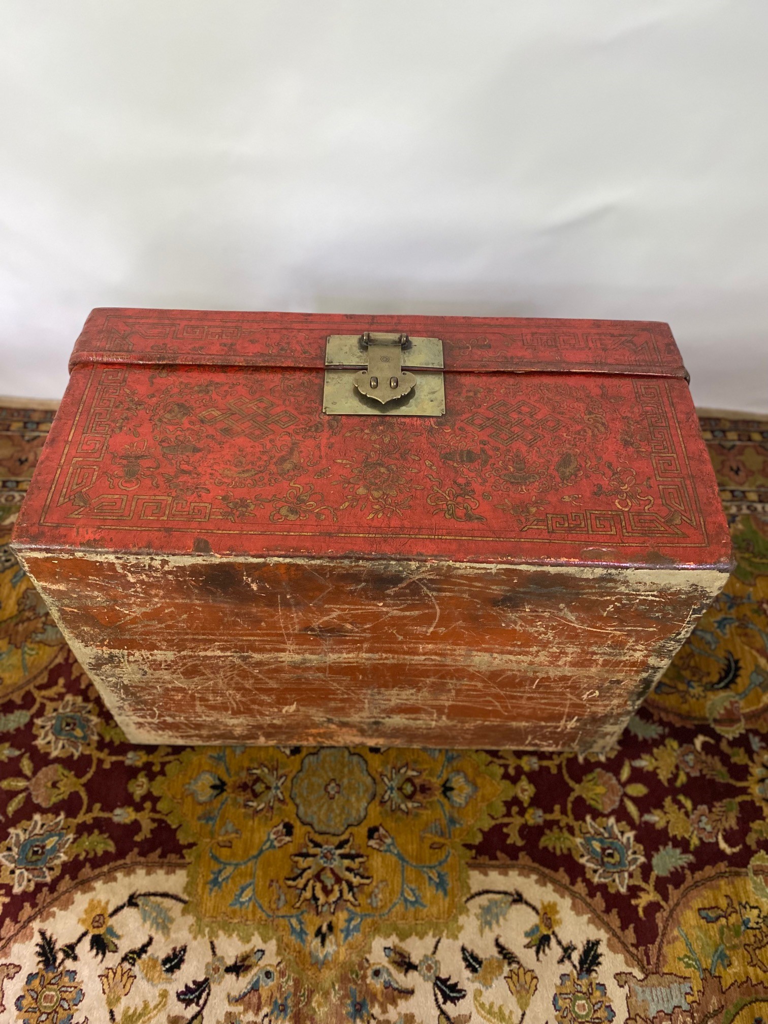 Old Decorated Red Leather Trunk | Wood and Hogan